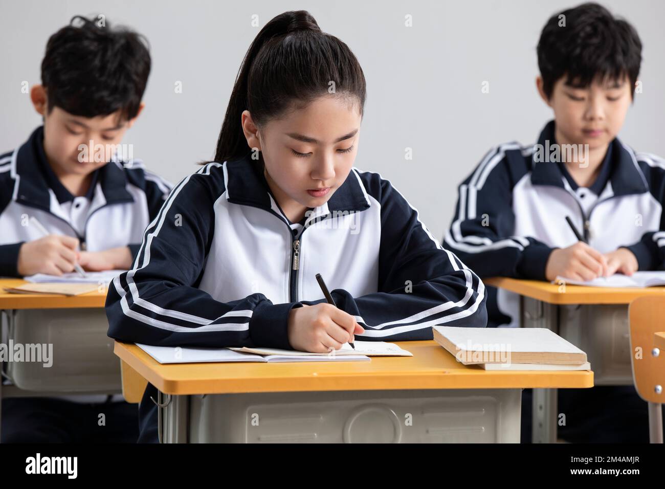 Chinese students learning in classroom Stock Photo - Alamy
