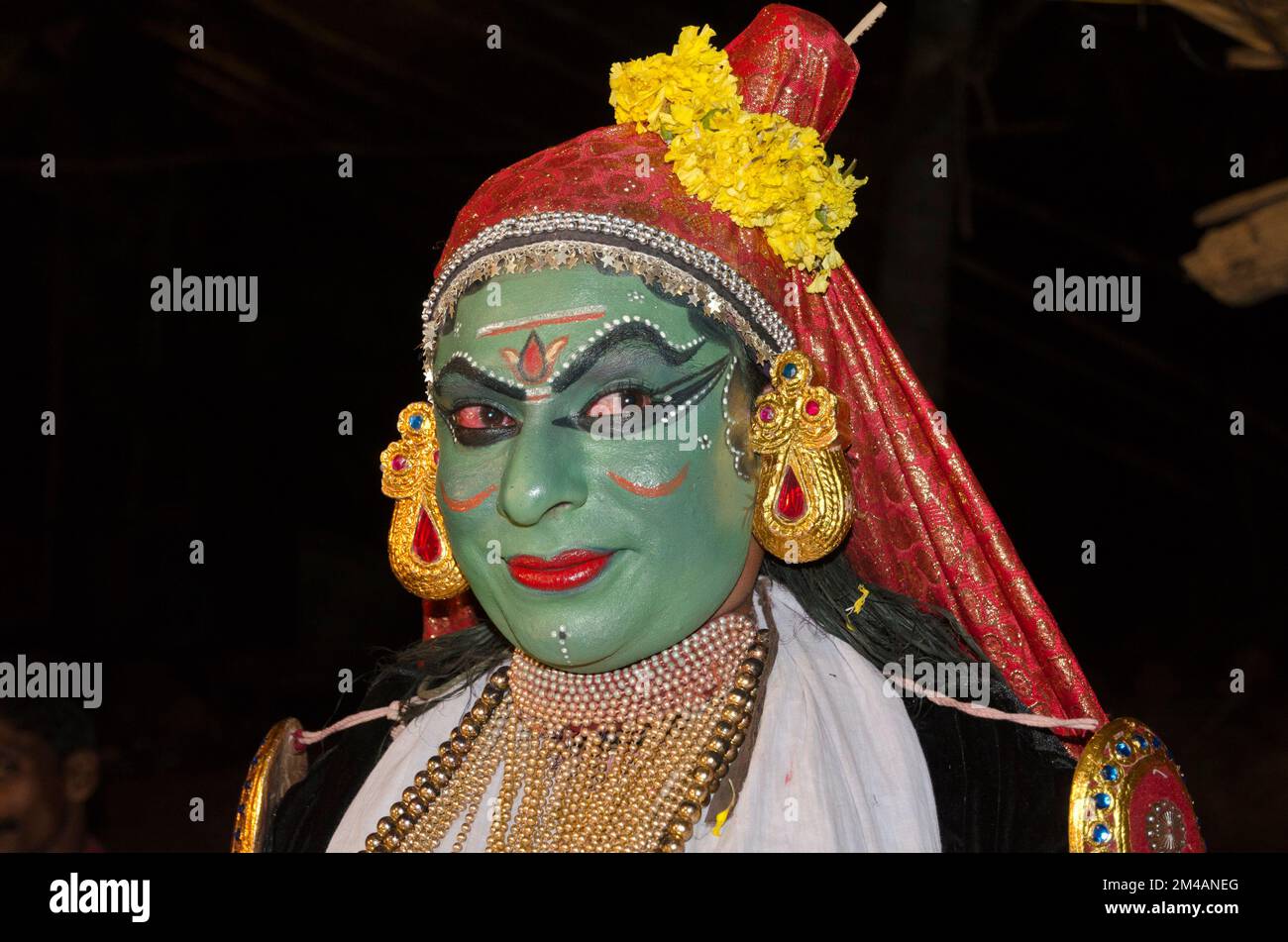 The make up of the Kathakali-character Kathalastri step by step Stock ...