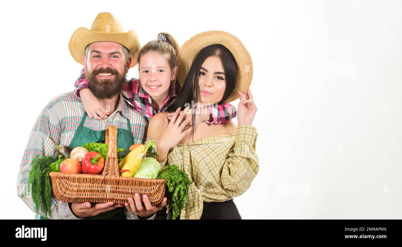 Parents and daughter celebrate harvest. Harvest festival concept ...