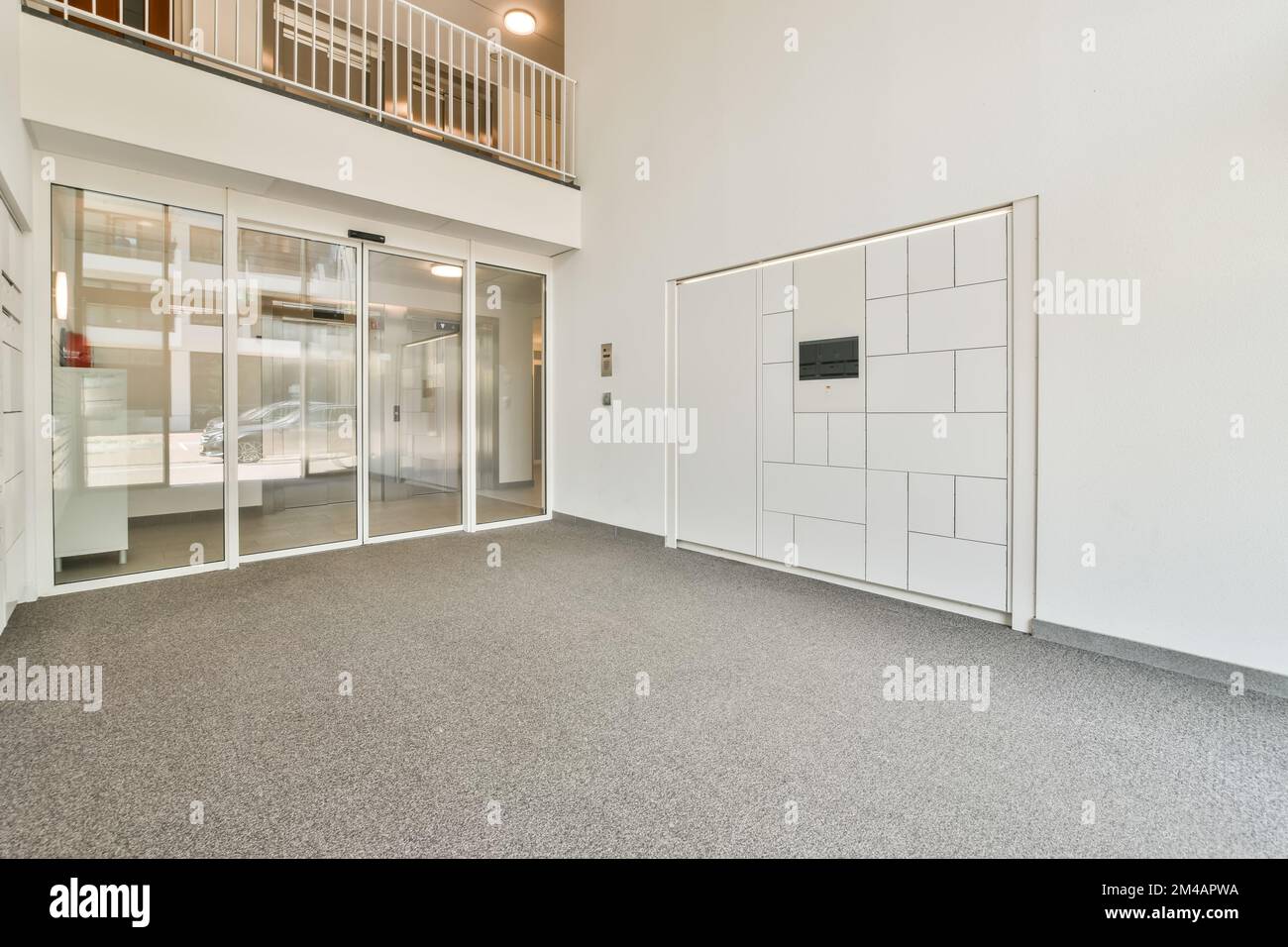 In perspective illuminated empty hall of a modern building with glass ...