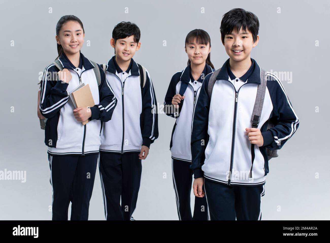 Portrait of cheerful Chinese students Stock Photo - Alamy