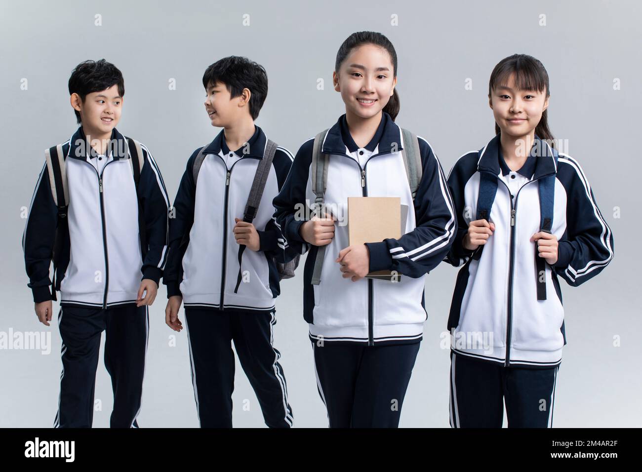 Portrait of cheerful Chinese students Stock Photo - Alamy