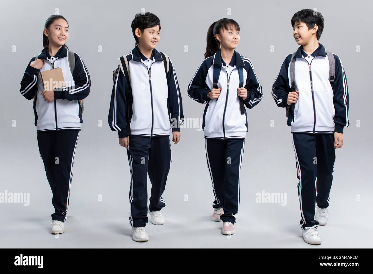 Chinese teenager in uniform hi-res stock photography and images - Alamy