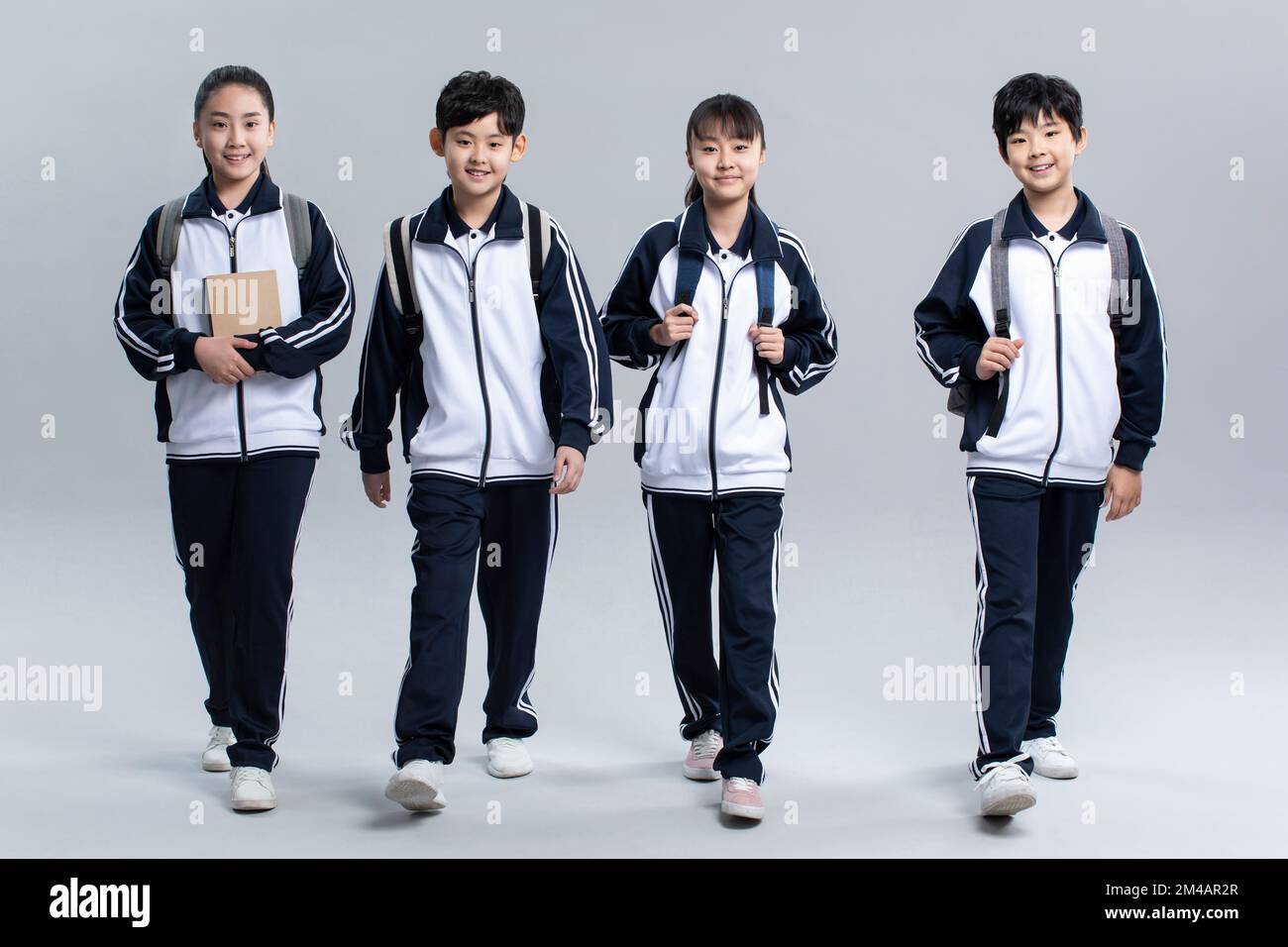 Chinese teenager in uniform hi-res stock photography and images - Alamy