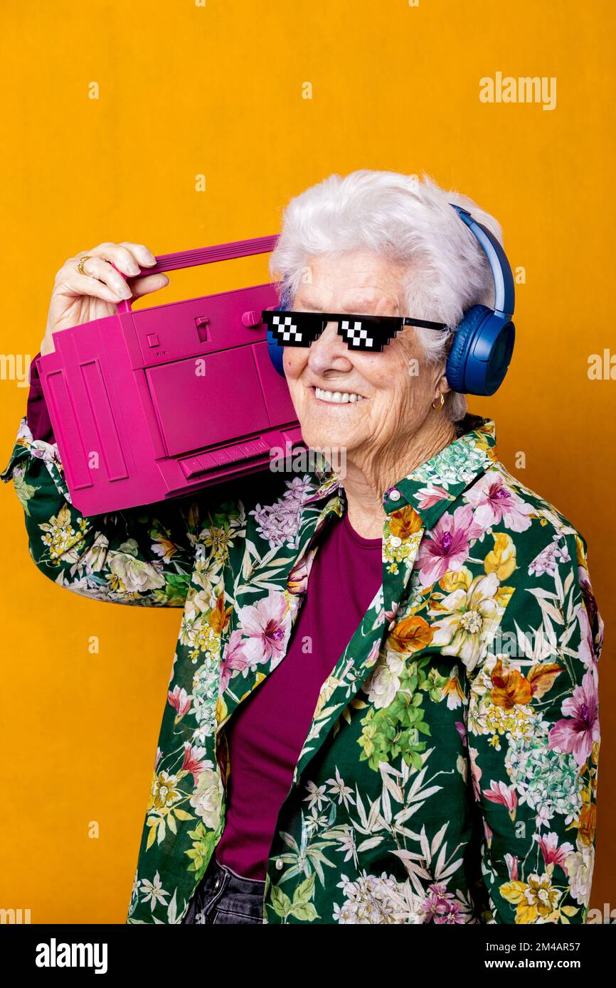 Carrying boombox hi-res stock photography and images - Alamy