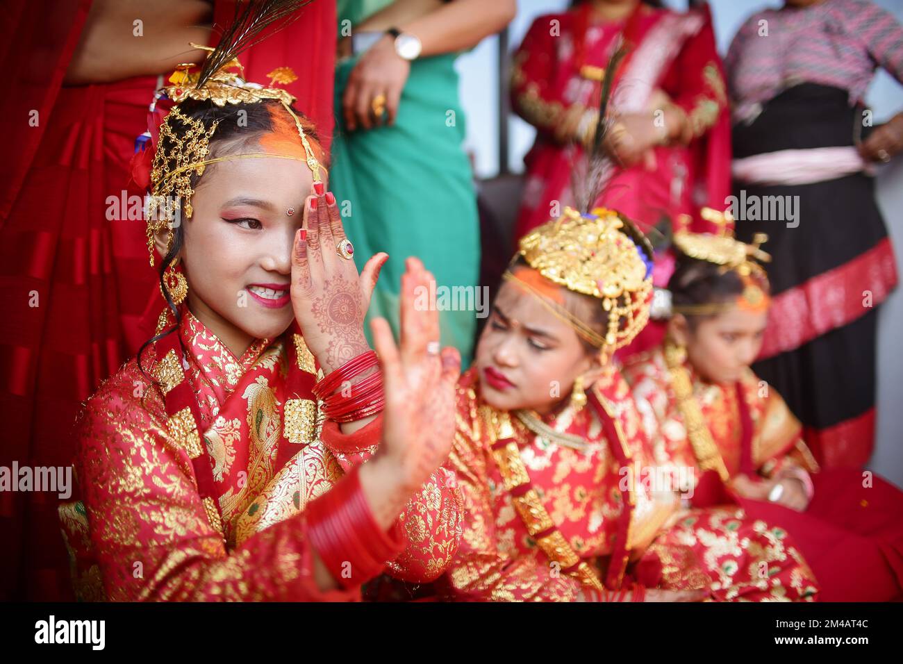 Nepal. 20th Dec, 2022. Little girl performs traditional ritual along ...