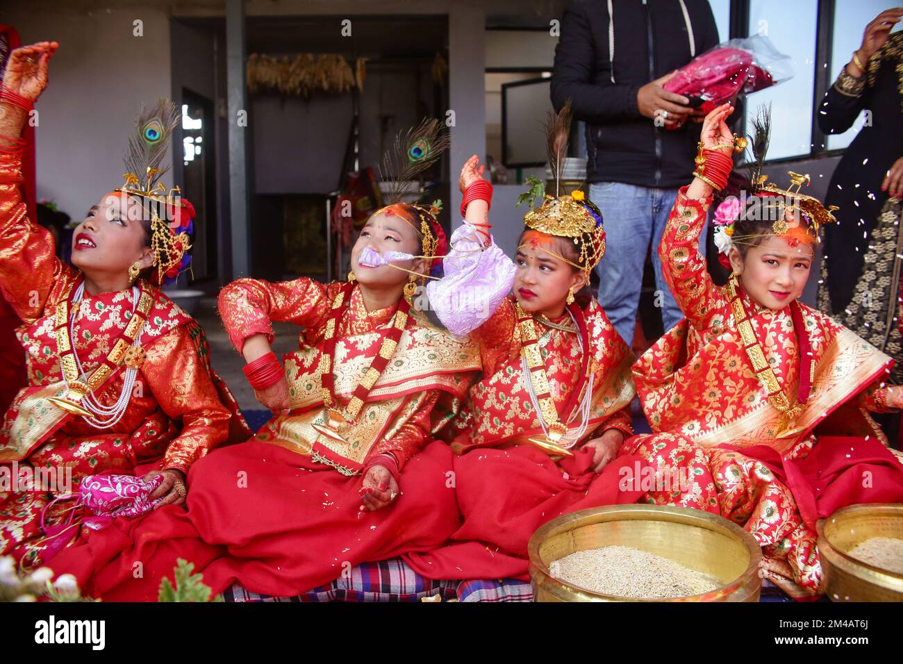 Nepal. 20th Dec, 2022. Little girl performs traditional ritual along ...