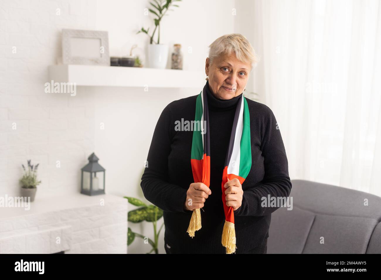 UAE flag. Woman holding the United Arab Emirates flag Stock Photo - Alamy