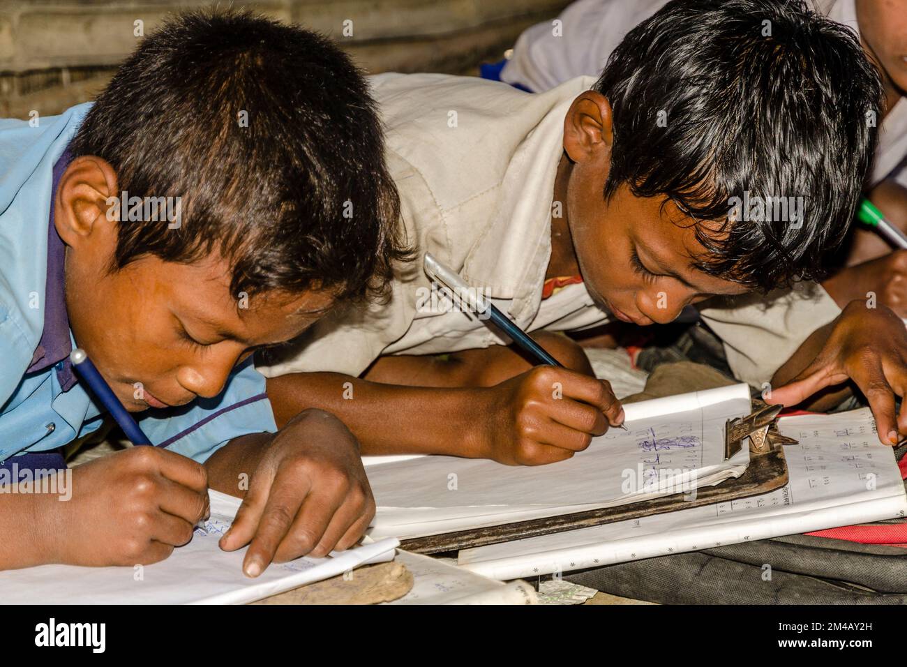 Children in the government school in Borbil still study on the floor ...