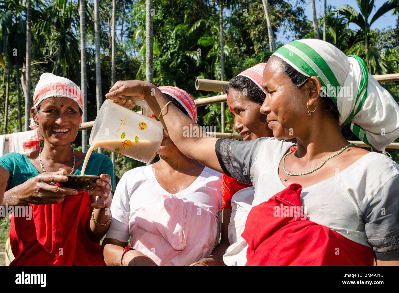 Women of the Deori-Tribe drinking the local beer at a family ...