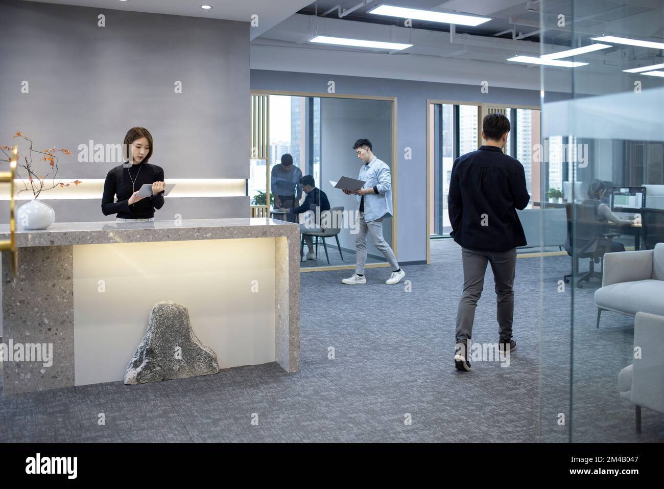 Chinese business people working in office Stock Photo - Alamy