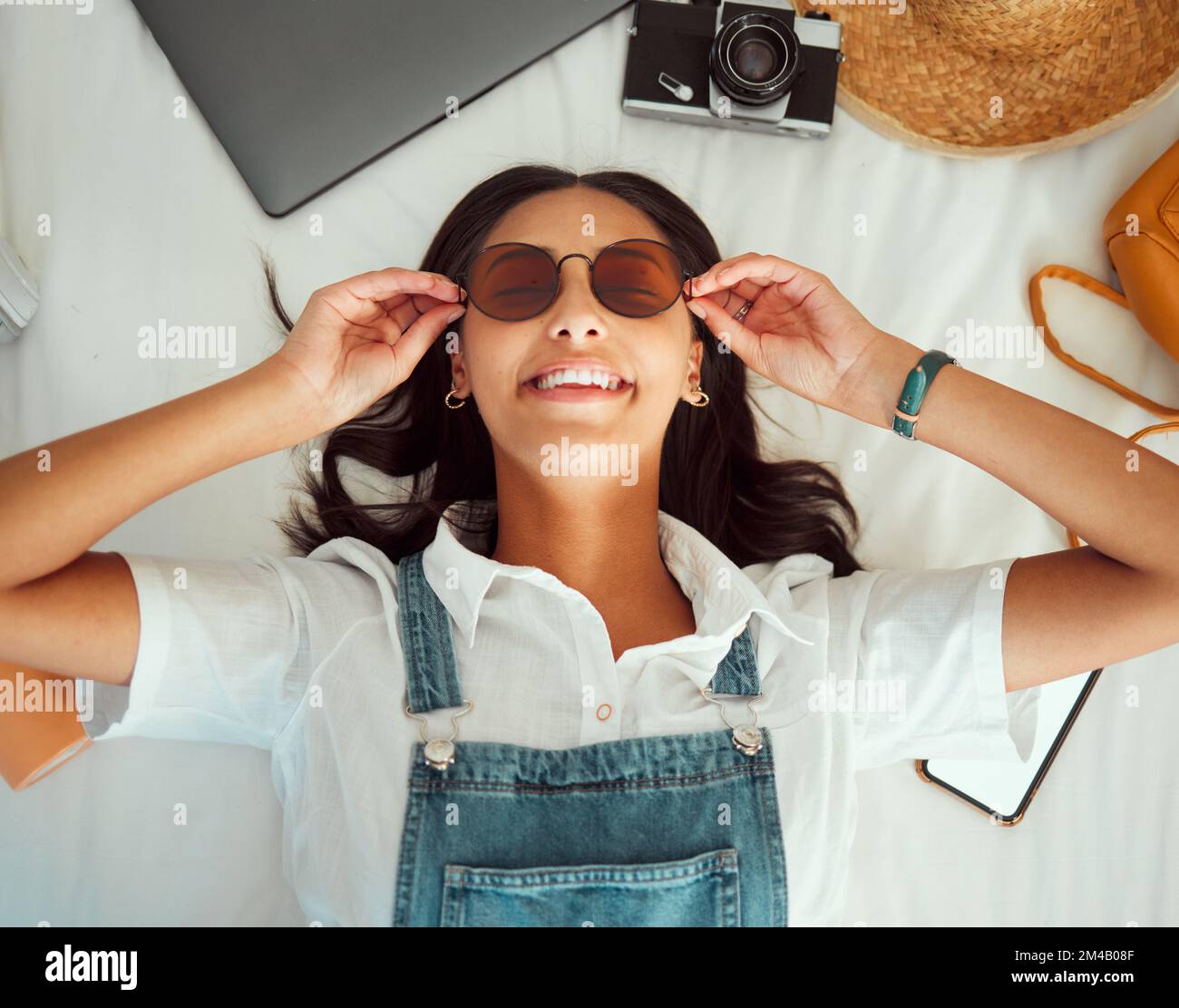 African woman packing suitcase hi-res stock photography and images - Alamy
