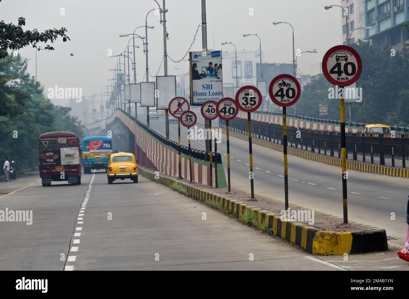 Funny signposts at a main Kolkata Road Stock Photo - Alamy