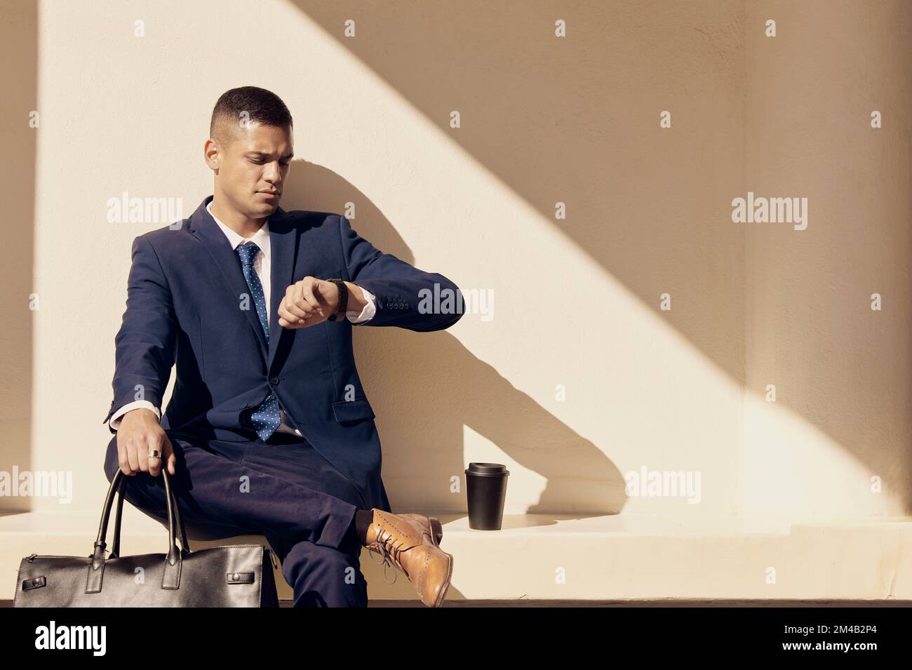 Man with clock hi-res stock photography and images - Alamy