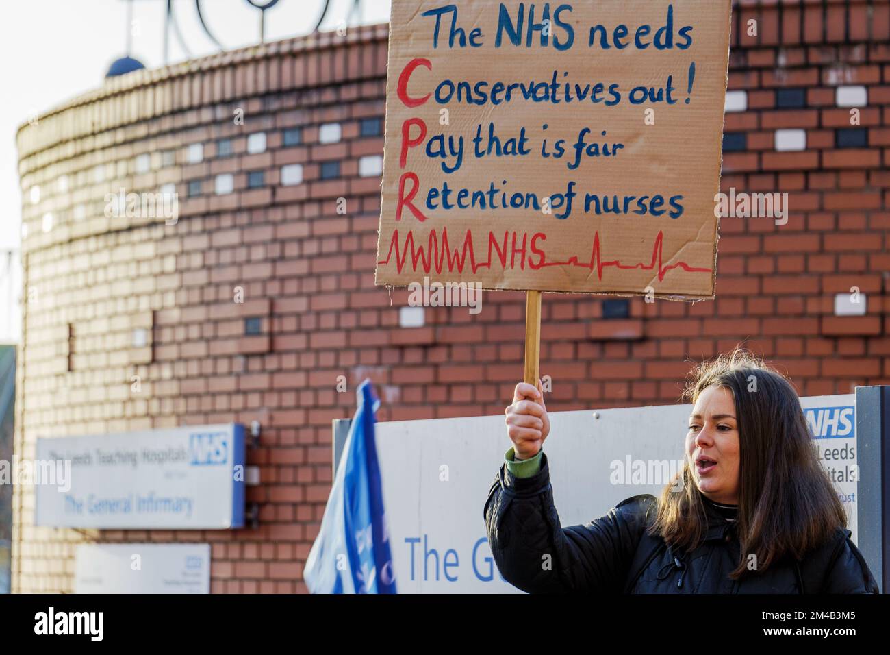 Leeds, UK. 20th December 2022. A lively crowd of nurses are striking ...