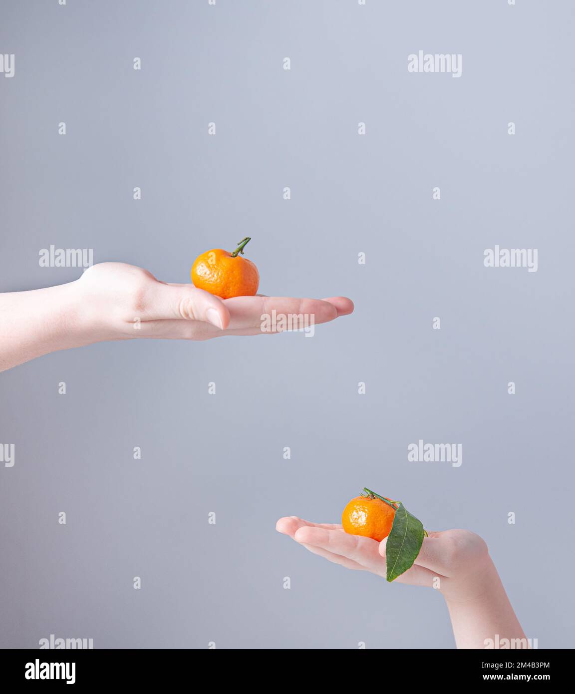 Two children eating fresh hi-res stock photography and images - Alamy