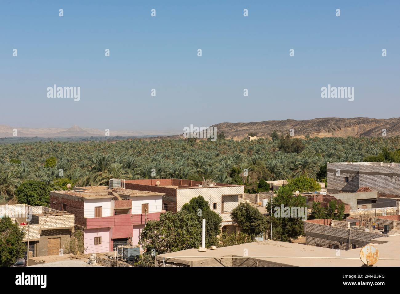 Panoramic view over remote african egyptian town with oasis and large ...