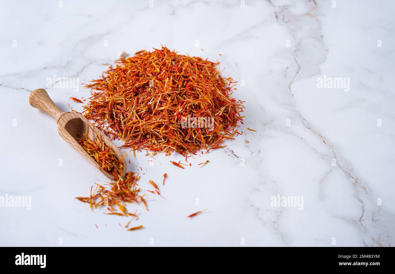 aroma oriental spice saffron on a marble table. Copy space Stock Photo ...