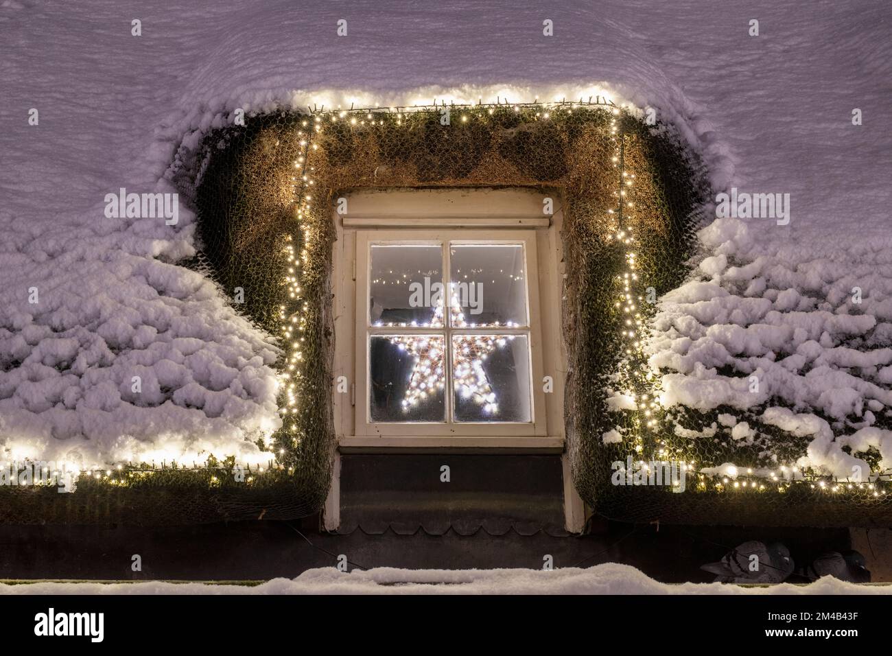 Whatever the Weather gift shop thatched roof and window star in the ...