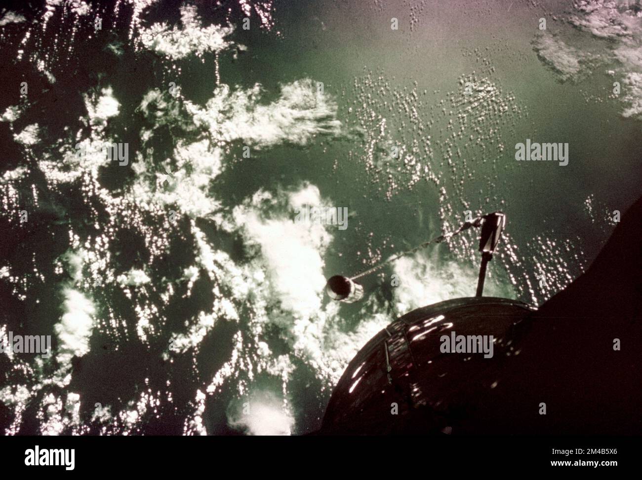 Project Gemini 12: A 30-meter long cable ties the spacecraft and the ...