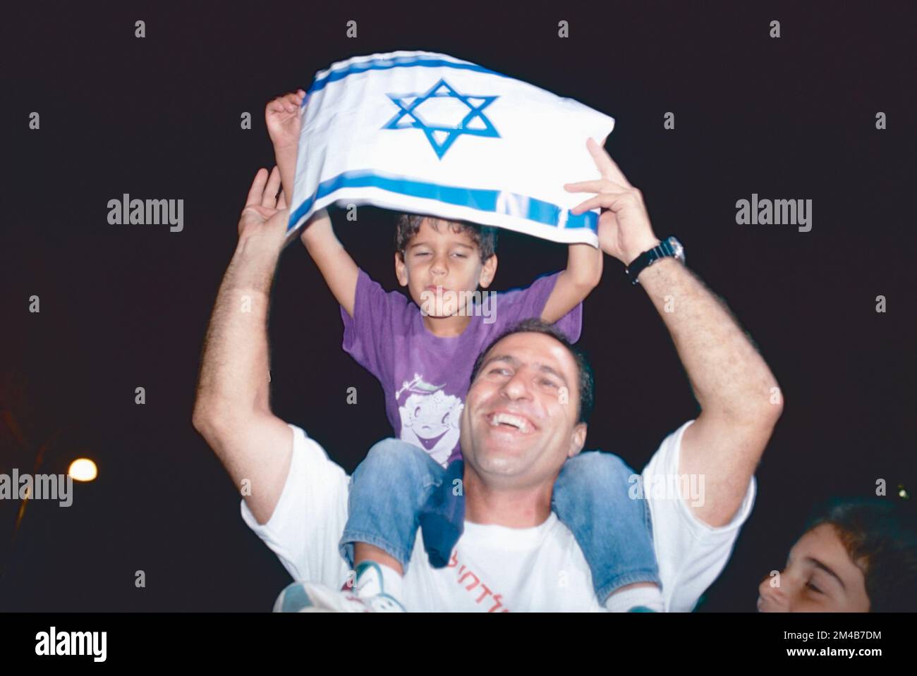 Italian Jews out the synagogue celebrating the reciprocal aknowledgment ...