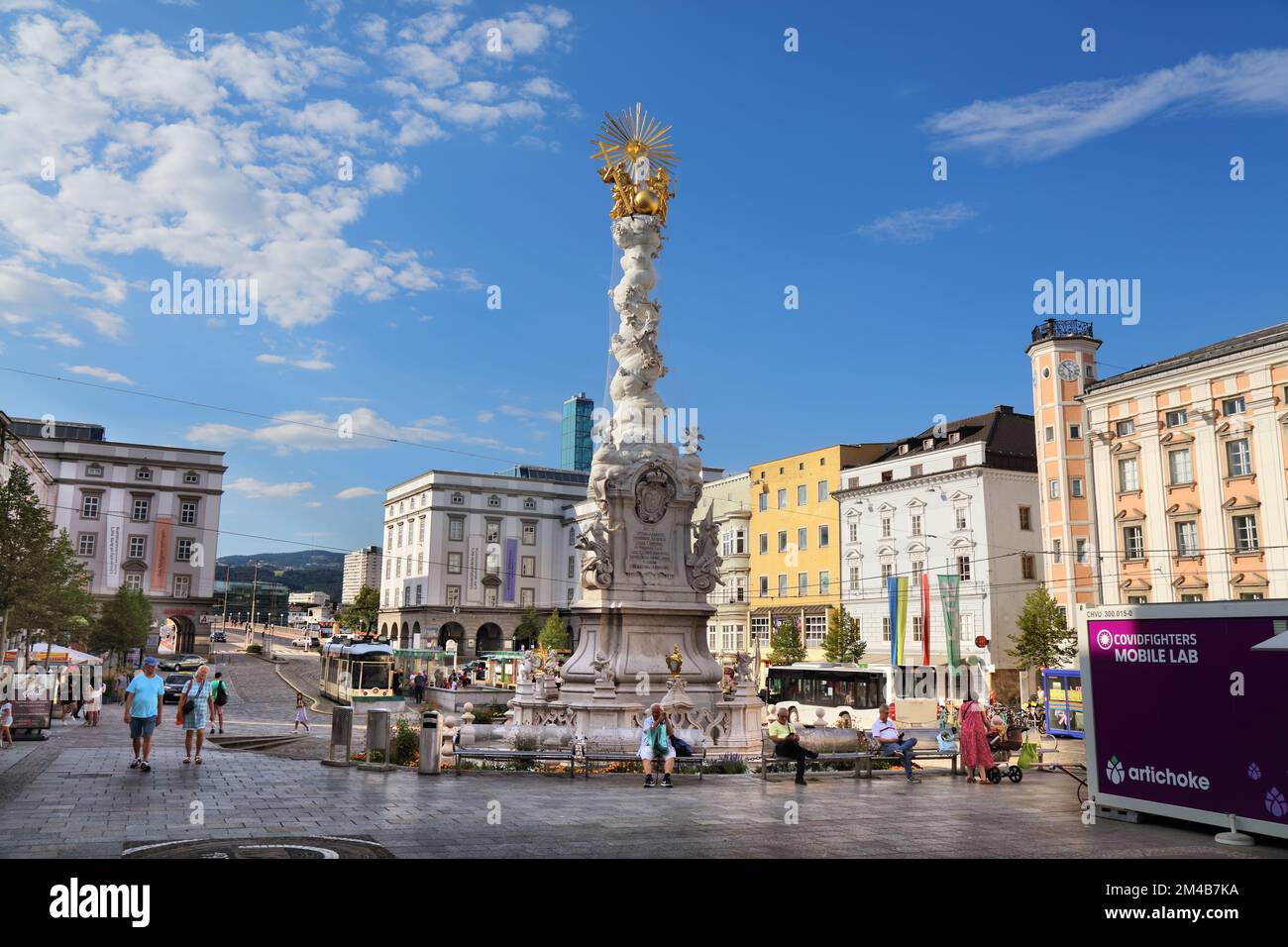 LINZ, AUSTRIA - AUGUST 1, 2022: People visit the main square Hauptplatz ...