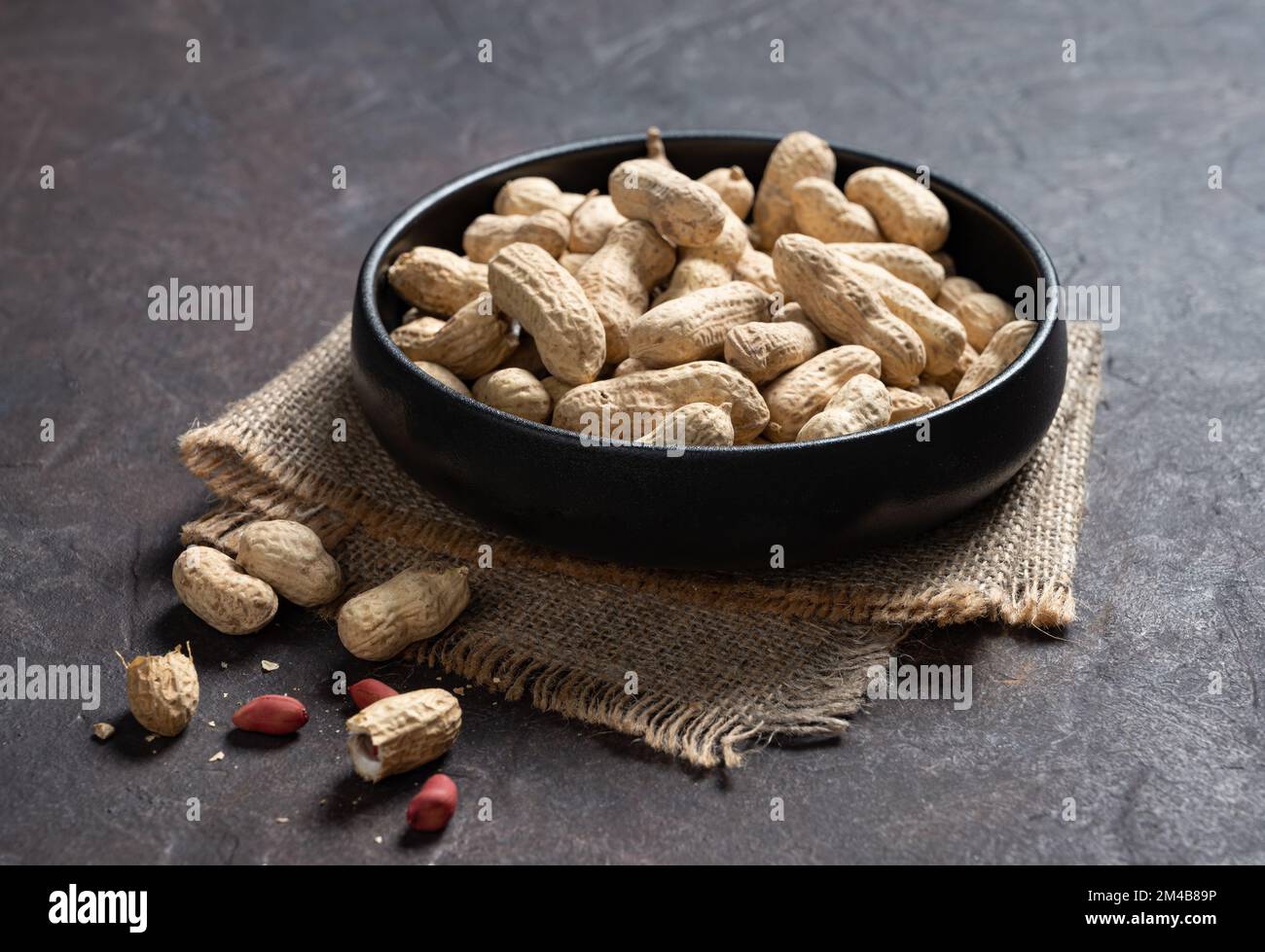 Organic unpeeled peanuts in hi-res stock photography and images - Alamy