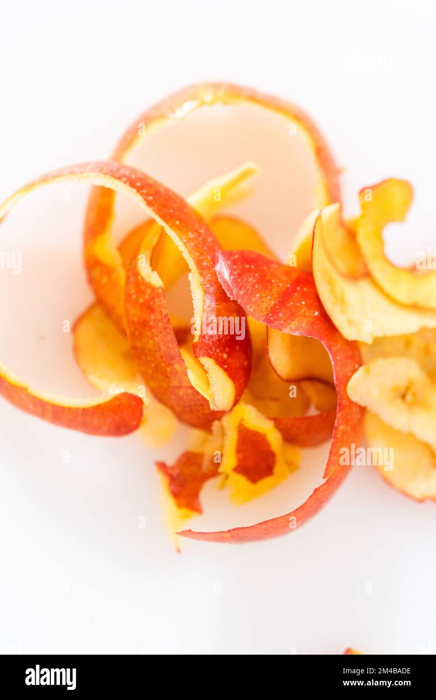 Peeling red apples Stock Photo - Alamy