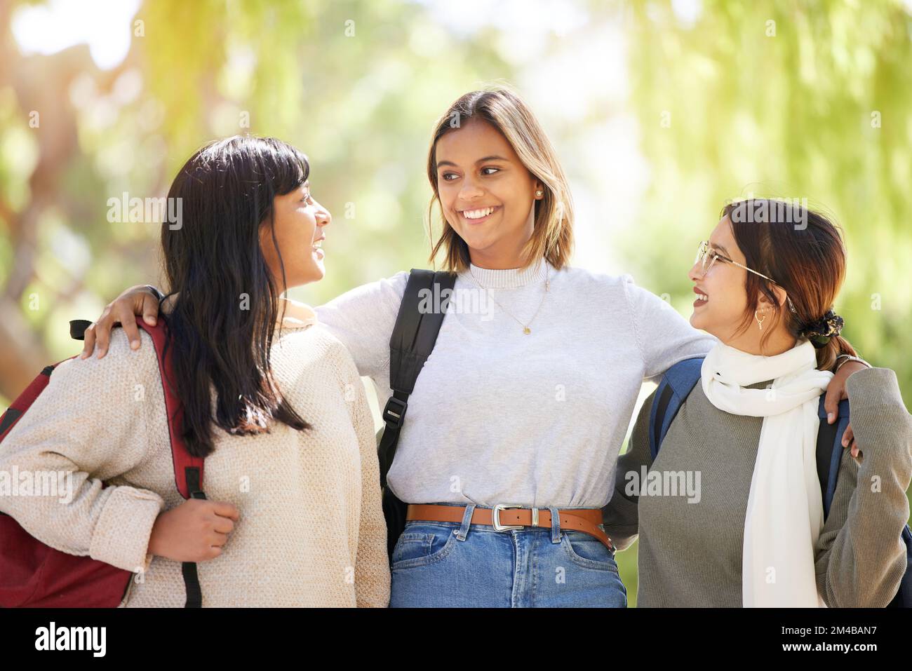 Nature, friends and students in university garden on campus walking ...