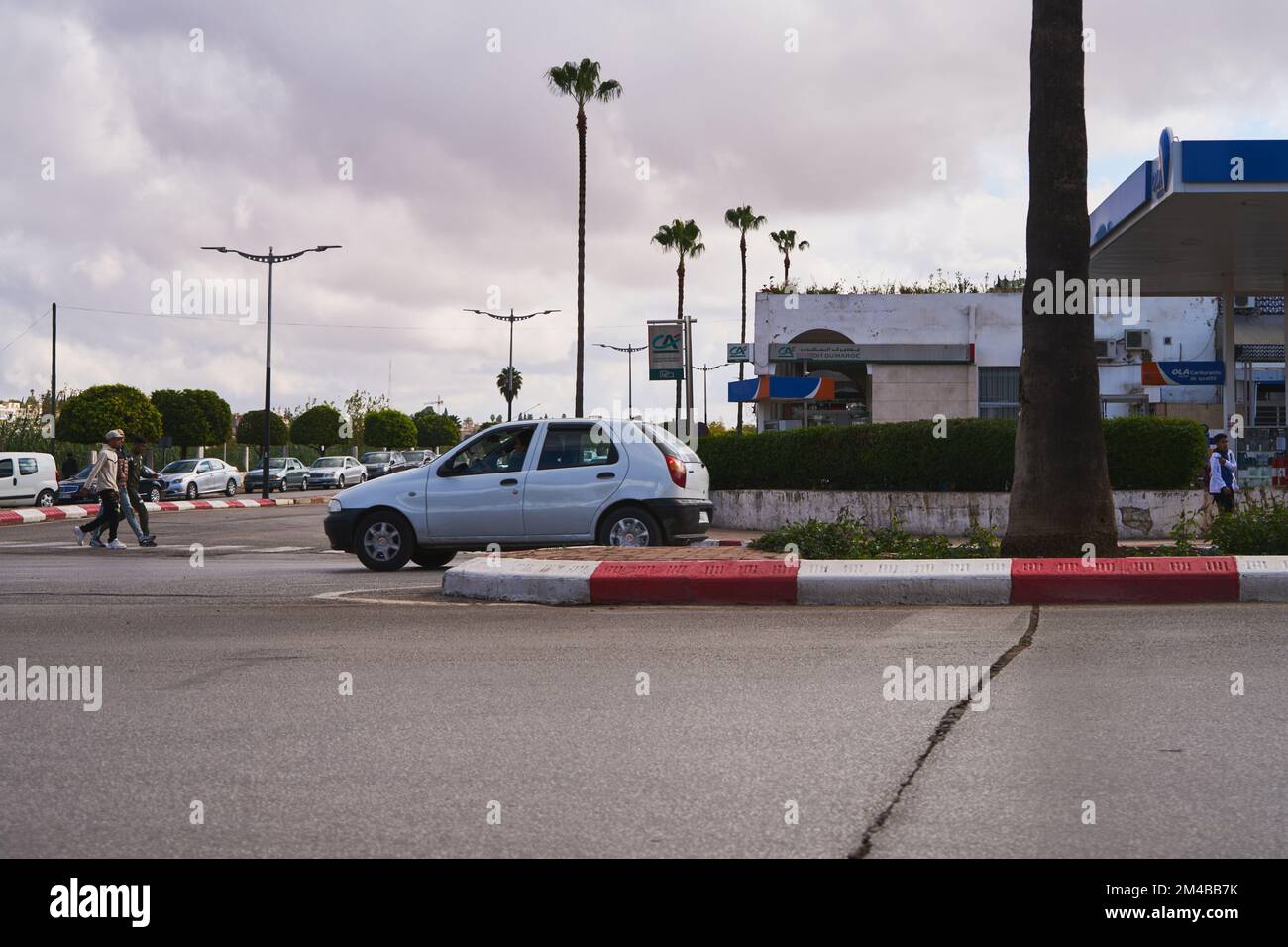 A small car in a Moroccan road from away Stock Photo - Alamy