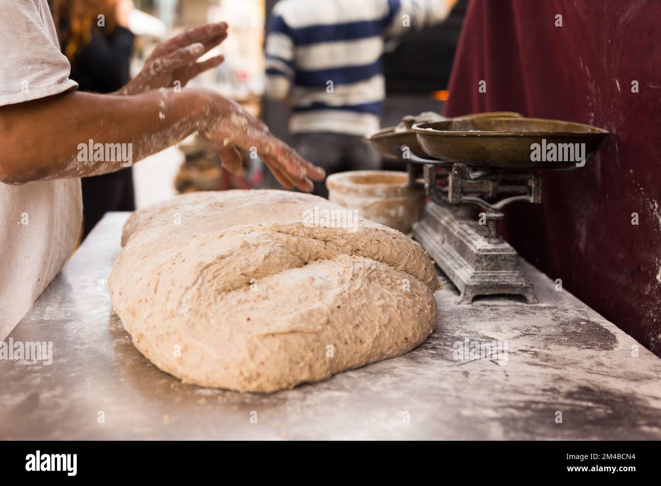 Brown hands making bread hi-res stock photography and images - Alamy