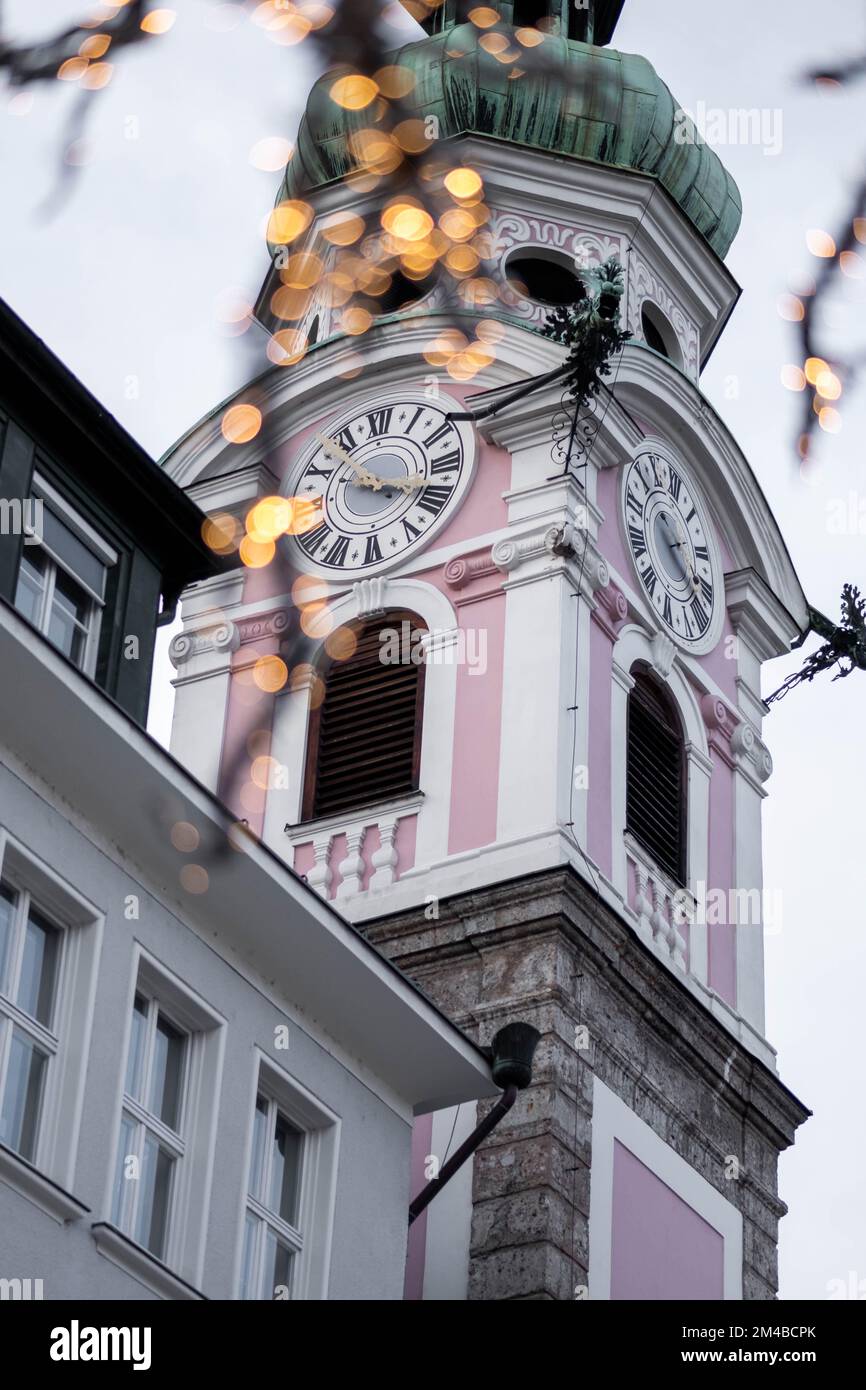A vertical low-angle shot of the tower of Spitalskirche. Hospital ...