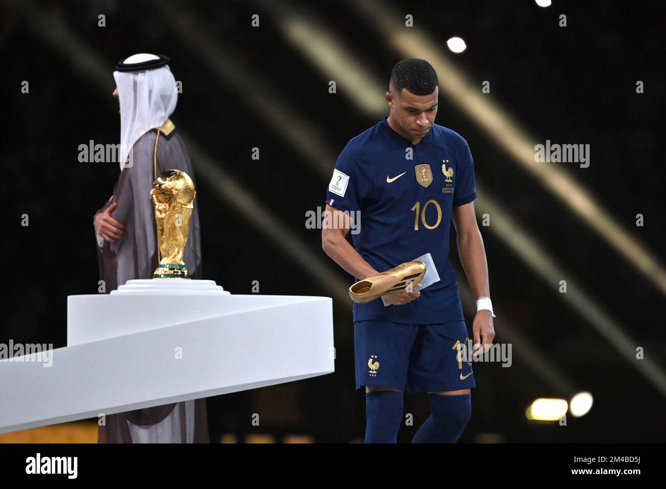Award ceremony: Kylian MBAPPE (FRA) walks past the trophy, cup, trophy ...