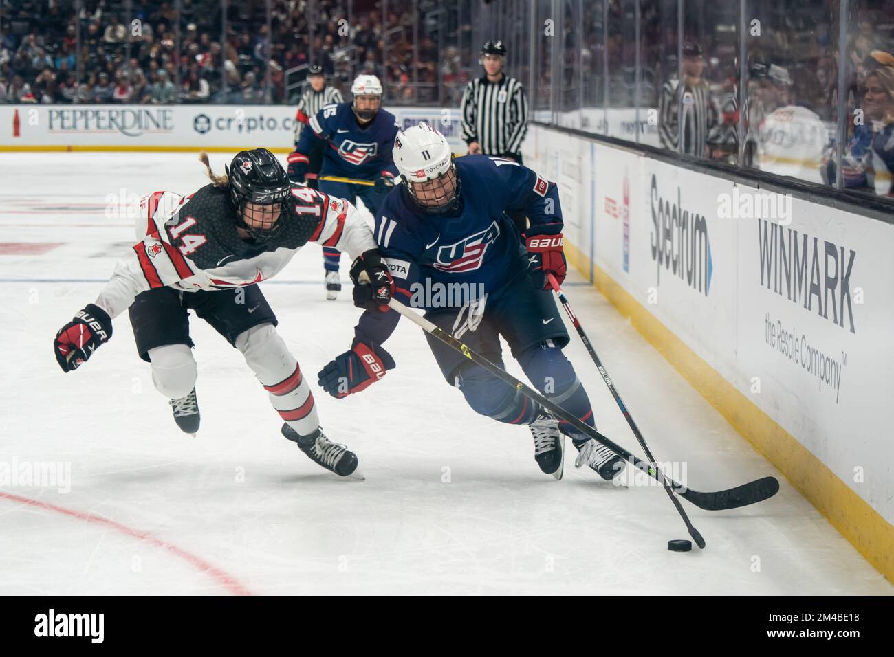 Team United States forward Abby Roque (11) is defended by Team Canada ...