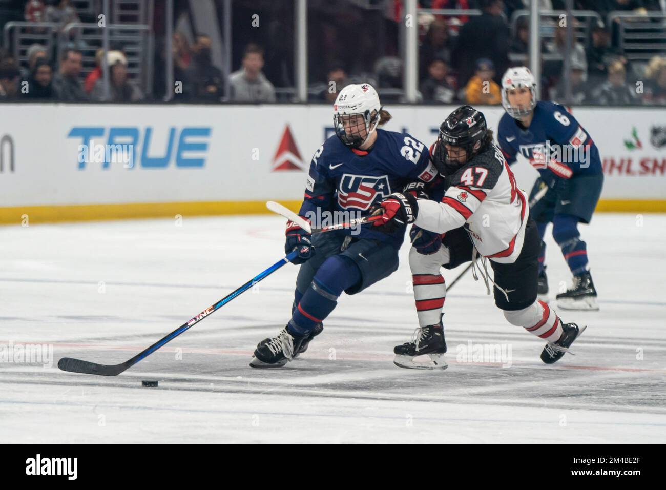 Team United States forward Tessa Janecke (22) is defended by Team ...