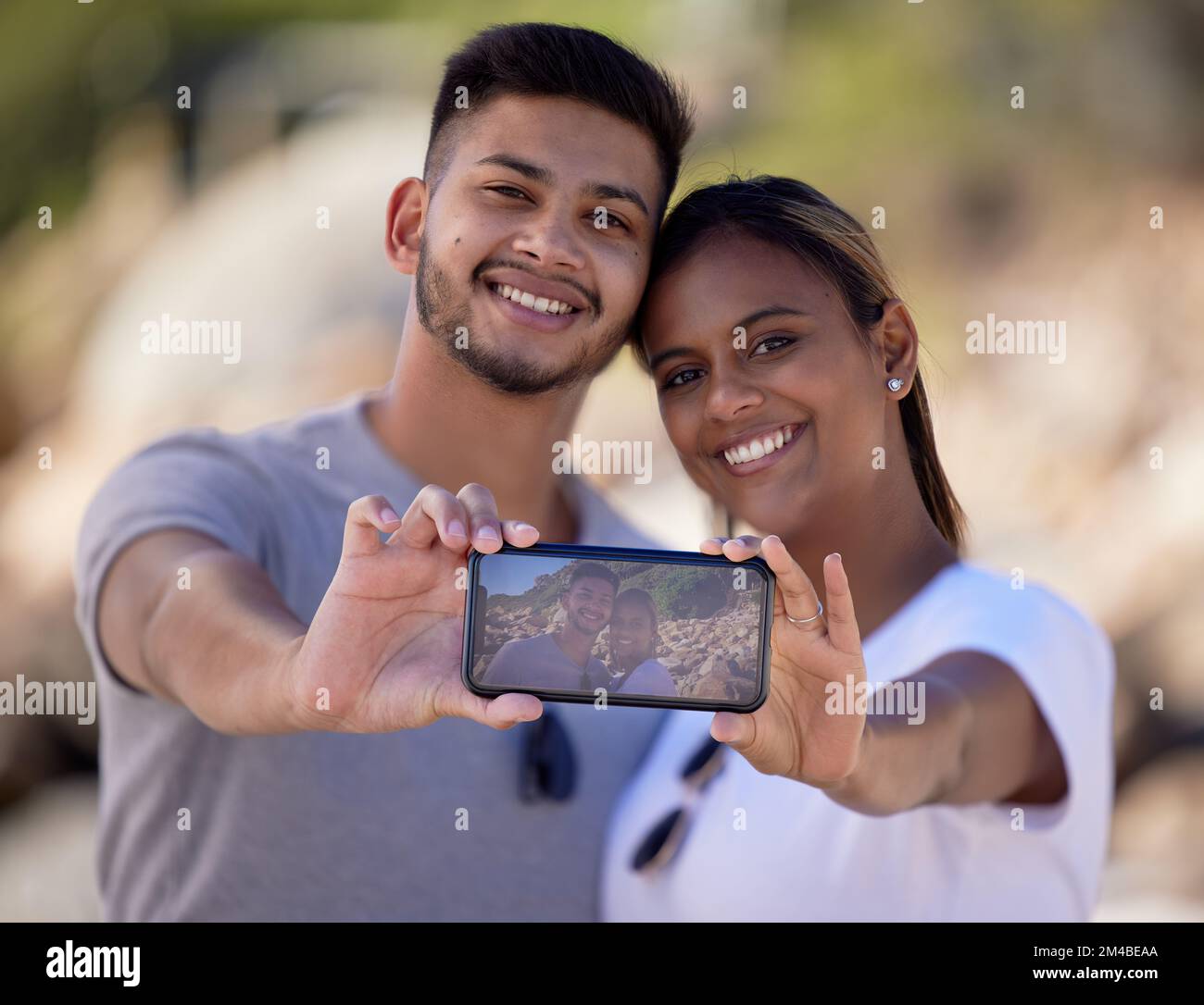 Happy couple, phone selfie and screen in nature, smile and memory on ...