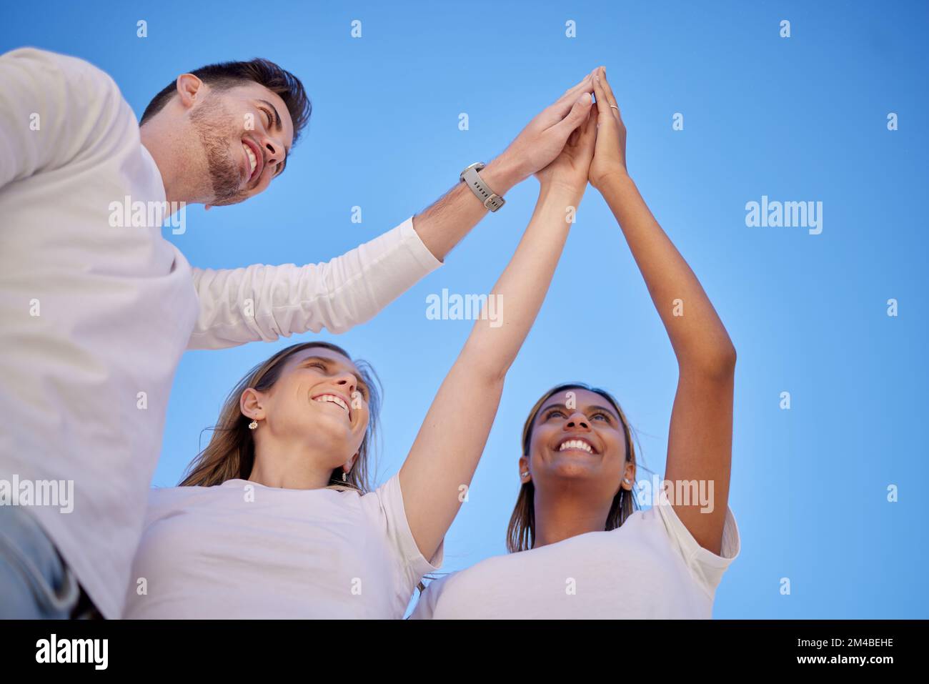 Group of friends, high five and team building for support, goal and ...