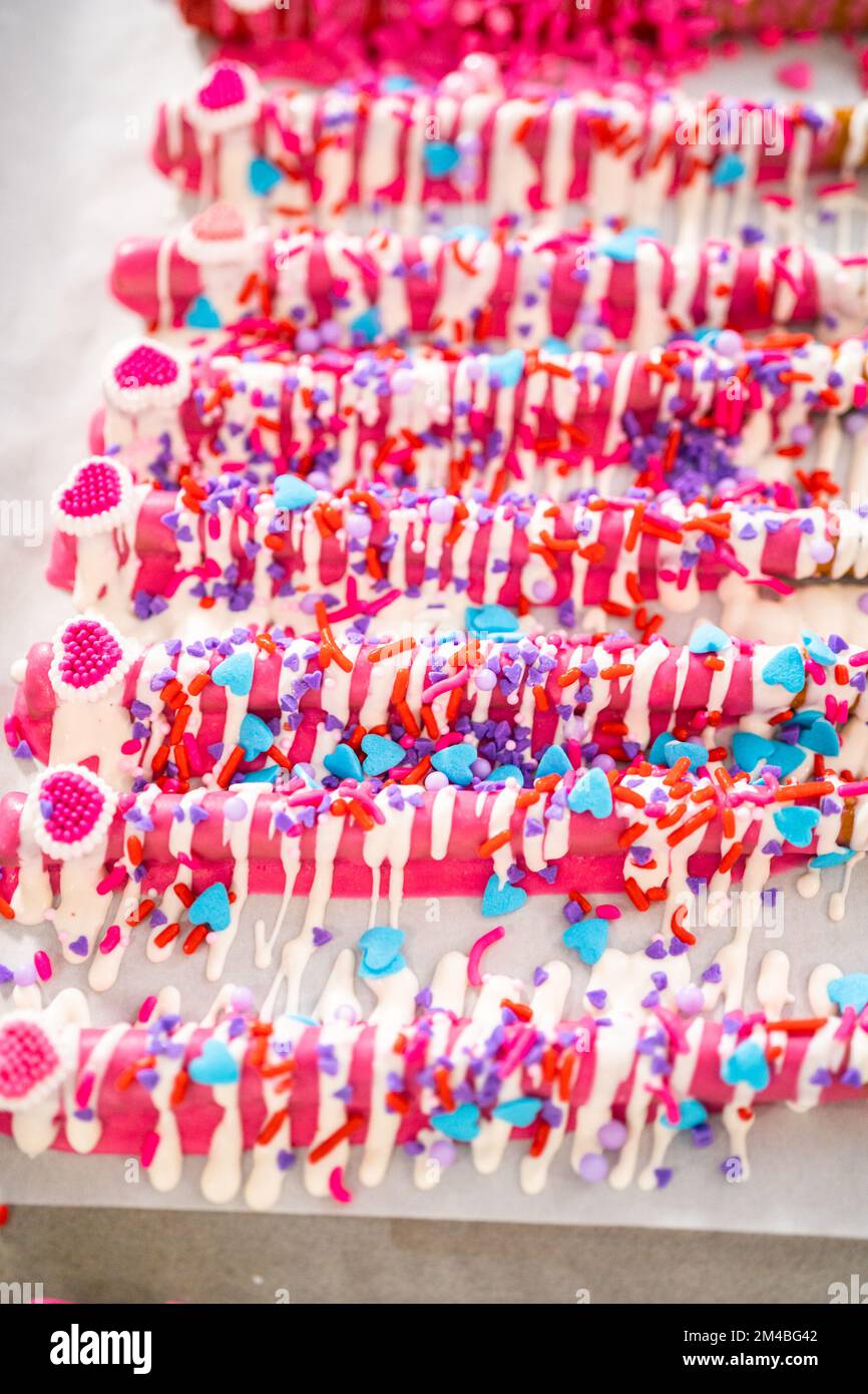 Valentine's Day Chocolate Covered Pretzel Rods Stock Photo - Alamy