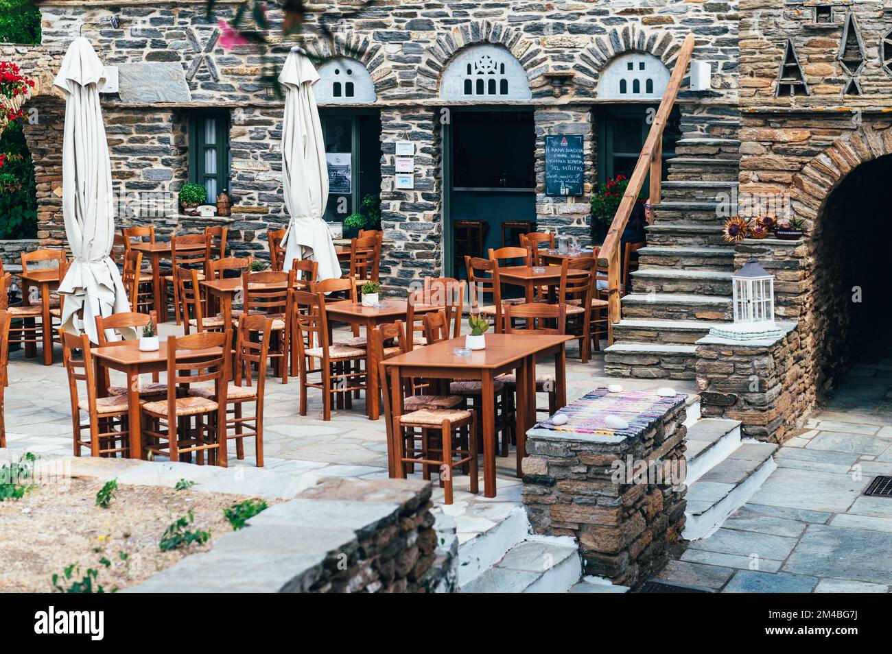 Cafe at Tinos Island, Cyclades, Greece Stock Photo - Alamy