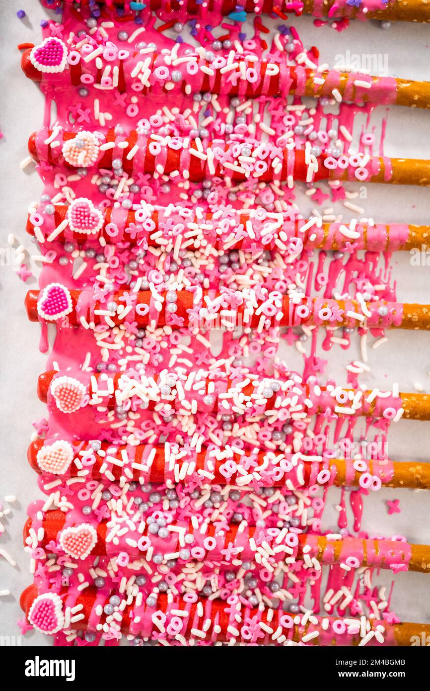 Valentine's Day Chocolate Covered Pretzel Rods Stock Photo - Alamy