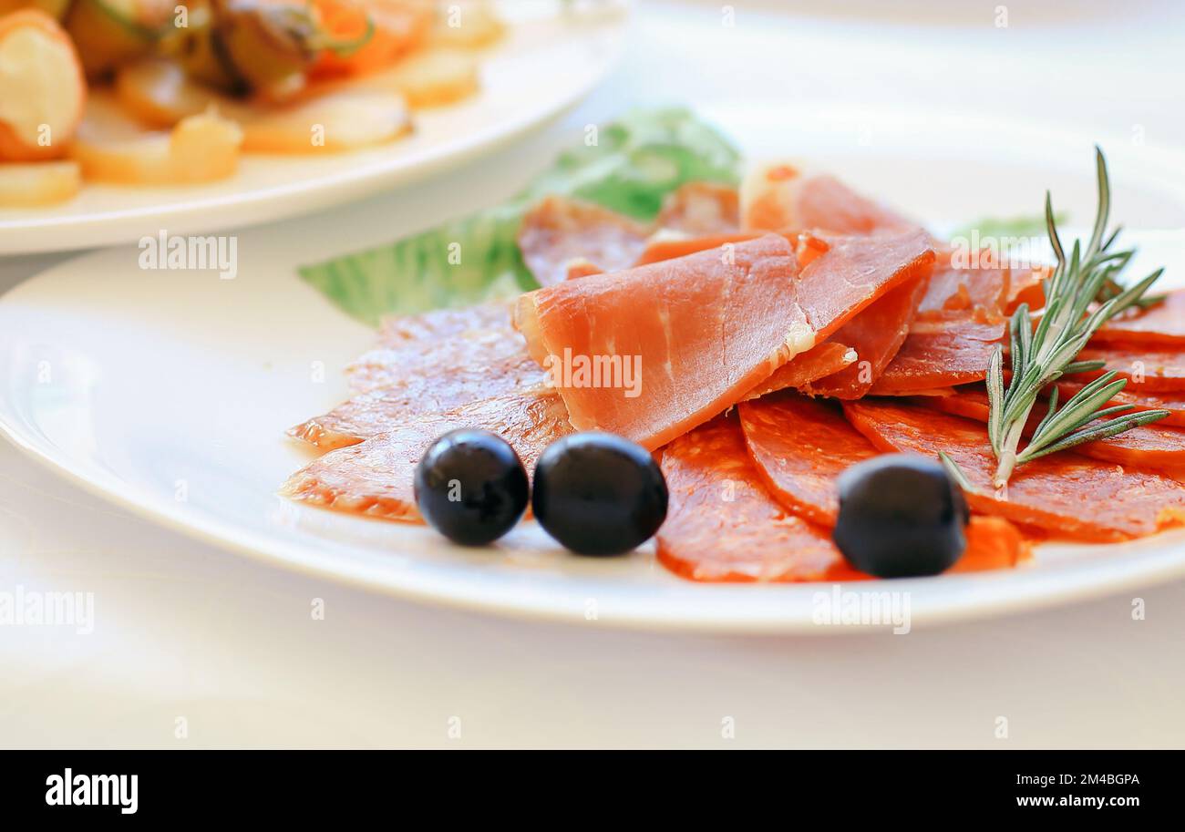 catering table set service with silverware and glass Stock Photo - Alamy