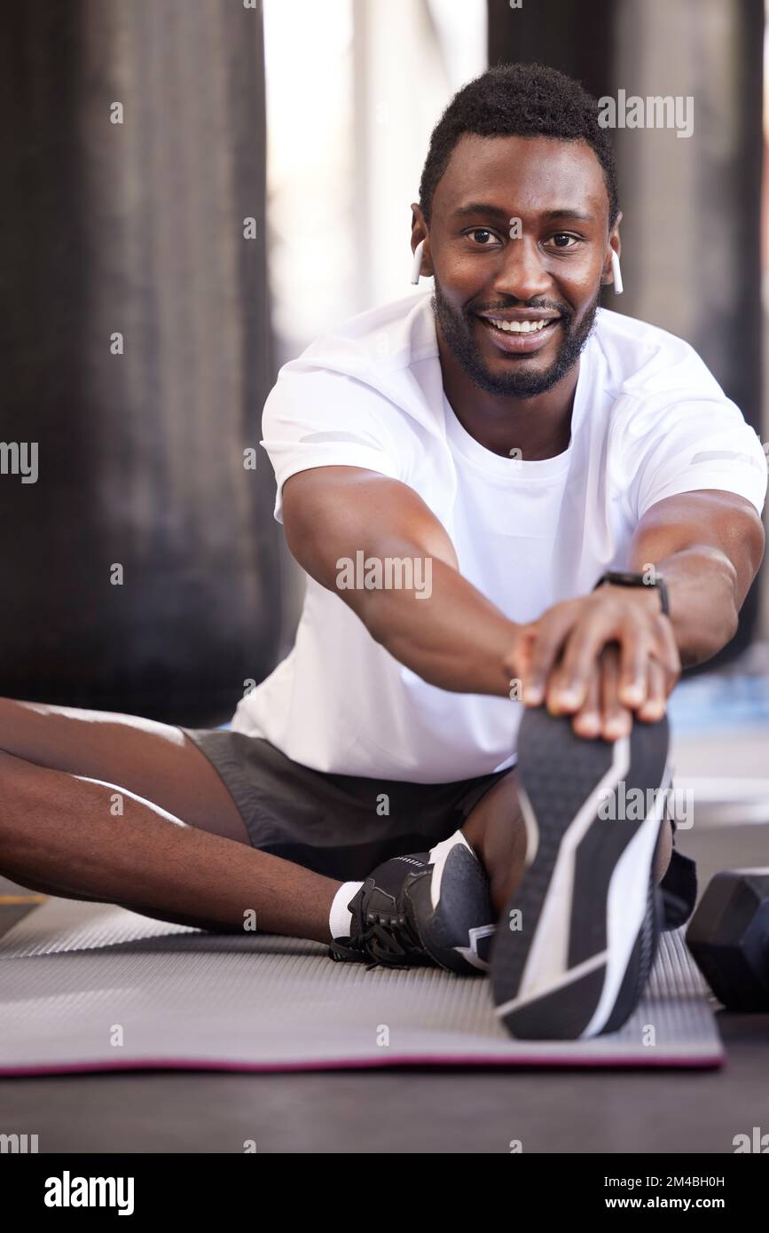 Fitness, stretching and portrait of black man in gym for exercise ...