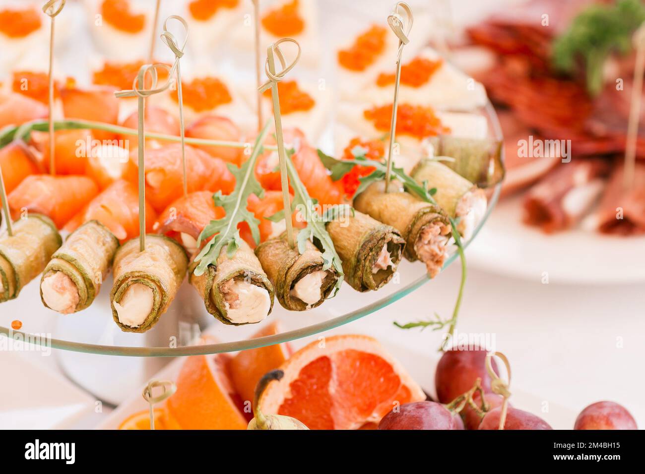 cold fish snacks on the festive table Stock Photo - Alamy