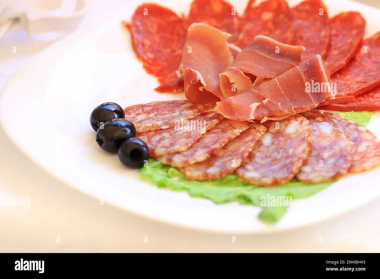 plate of cold meats on the table Stock Photo - Alamy