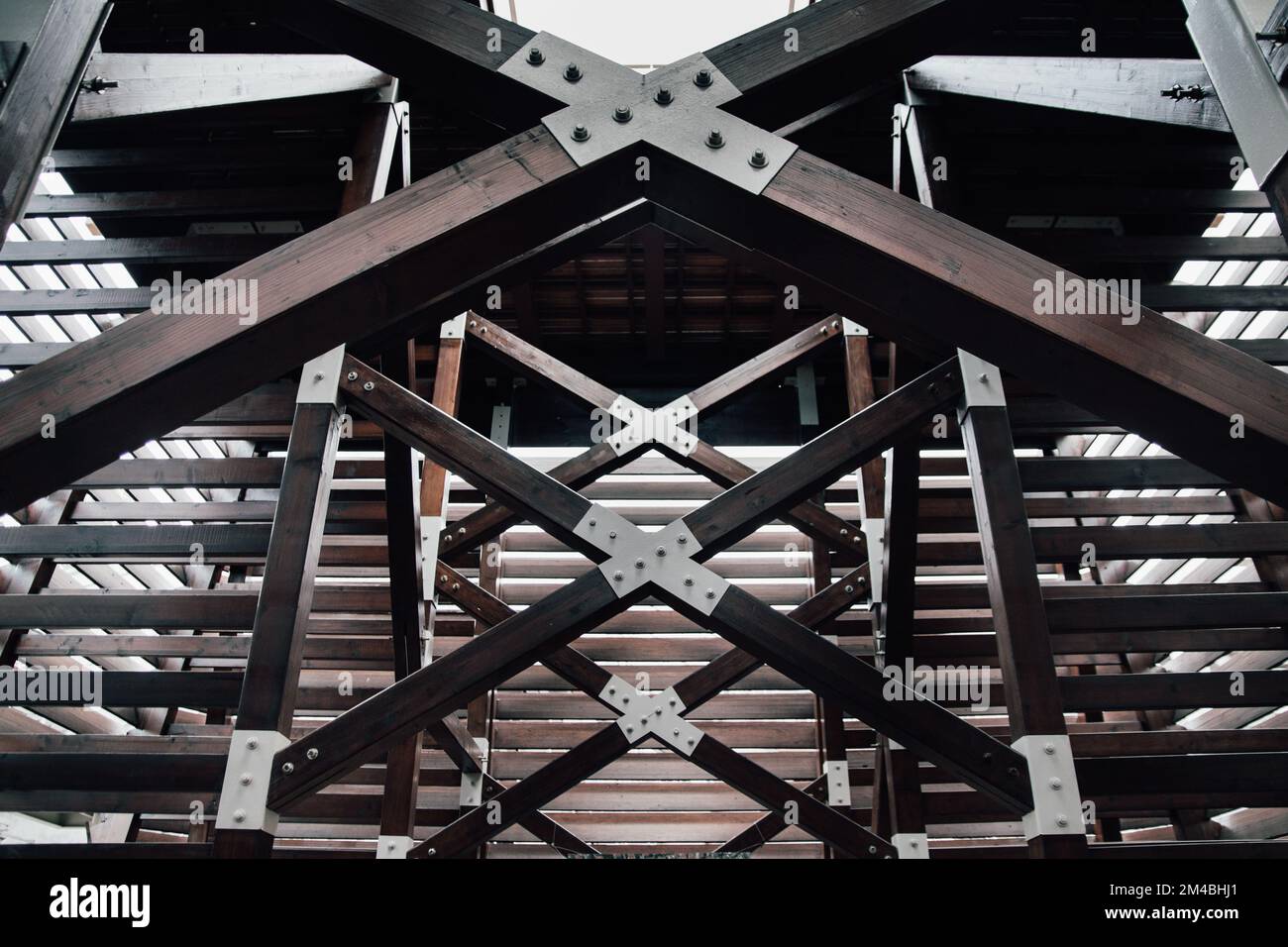 A closeup of the wooden parts framed together in a building during the ...