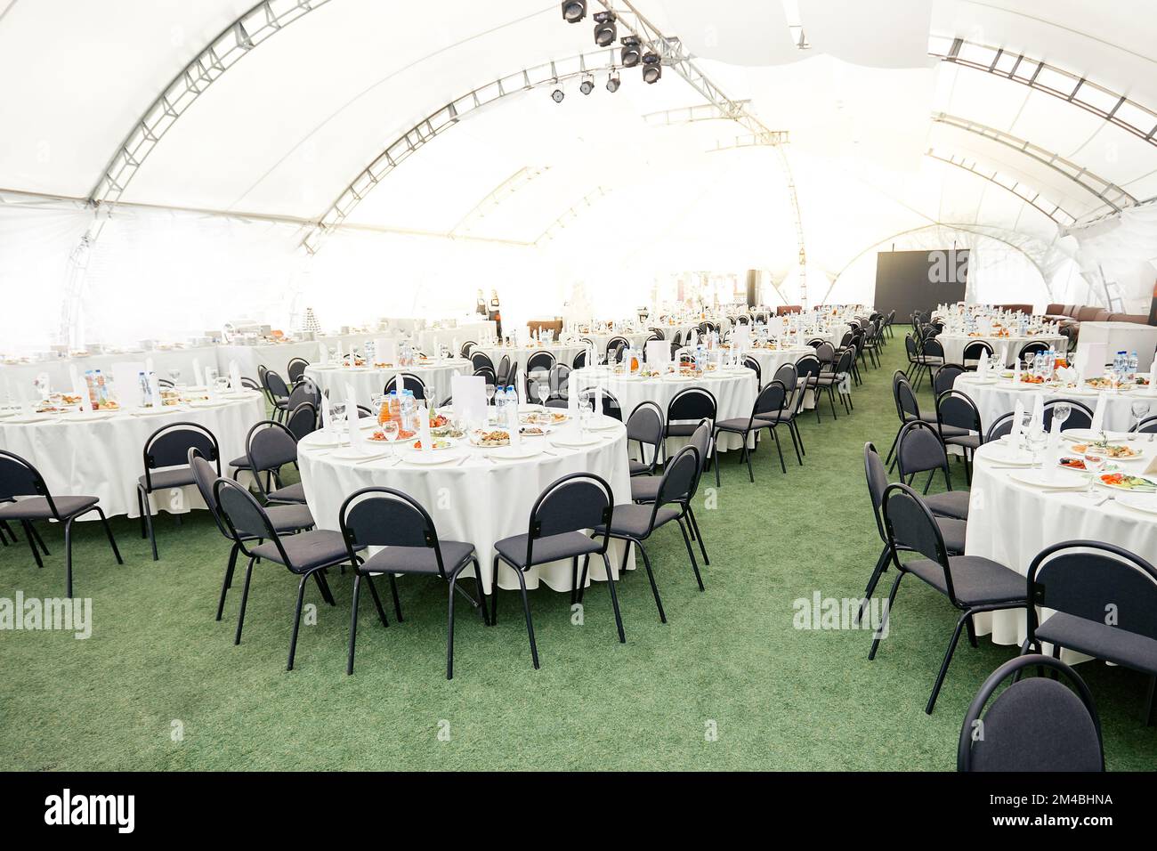large dining room in a modern restaurant Stock Photo - Alamy