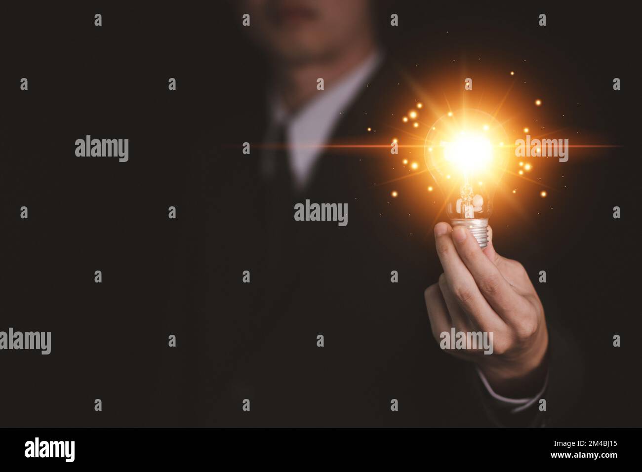 Businessman hand hold Virtual lightbulb. New ideas inspiration and ...