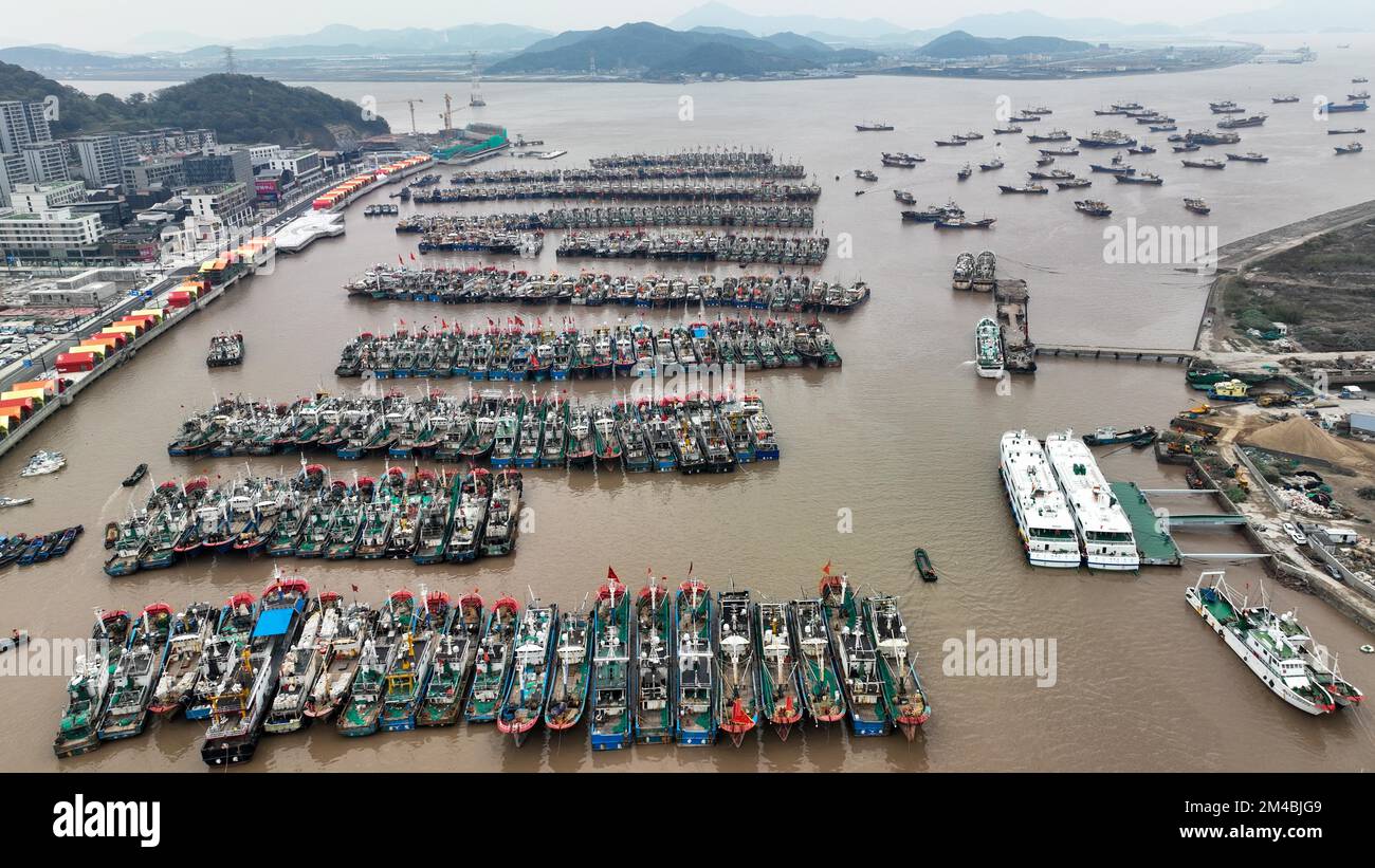 Aerial photo shows fishing boats returning to the harbor to avoid cold ...