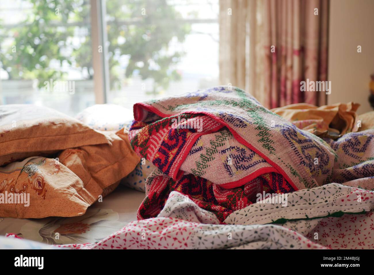 messy bed in early morning , messy bed after waking up Stock Photo - Alamy