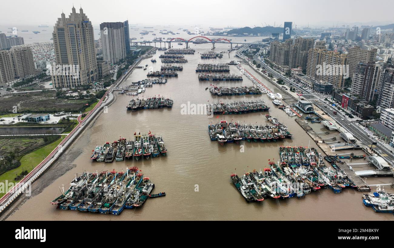 Aerial photo shows fishing boats returning to the harbor to avoid cold ...